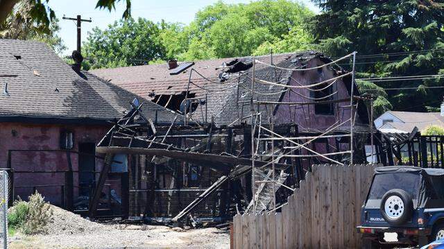 House fire near downtown Modesto CA displaces nine people | Modesto Bee