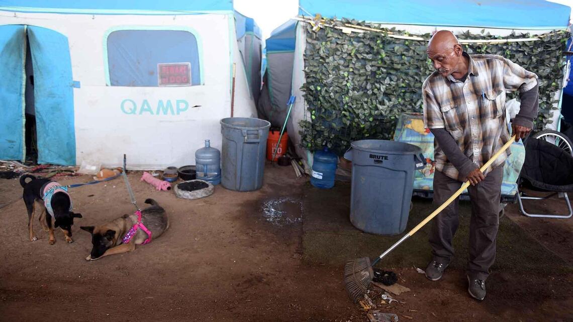 Homeless torn as Modesto CA tent city closes, shelter opens | Modesto Bee